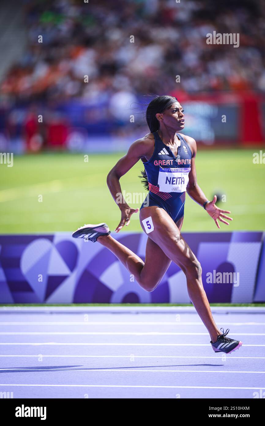 Daryll Neita participating in the 200 meters at the Paris 2024 Olympic ...