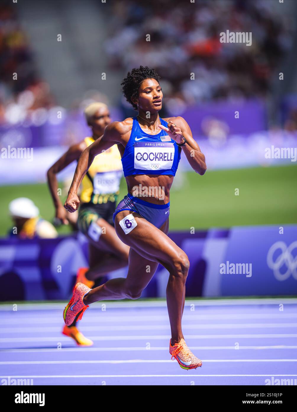Anna Cockrell participating in the 400 meters hurdles at the Paris 2024 ...