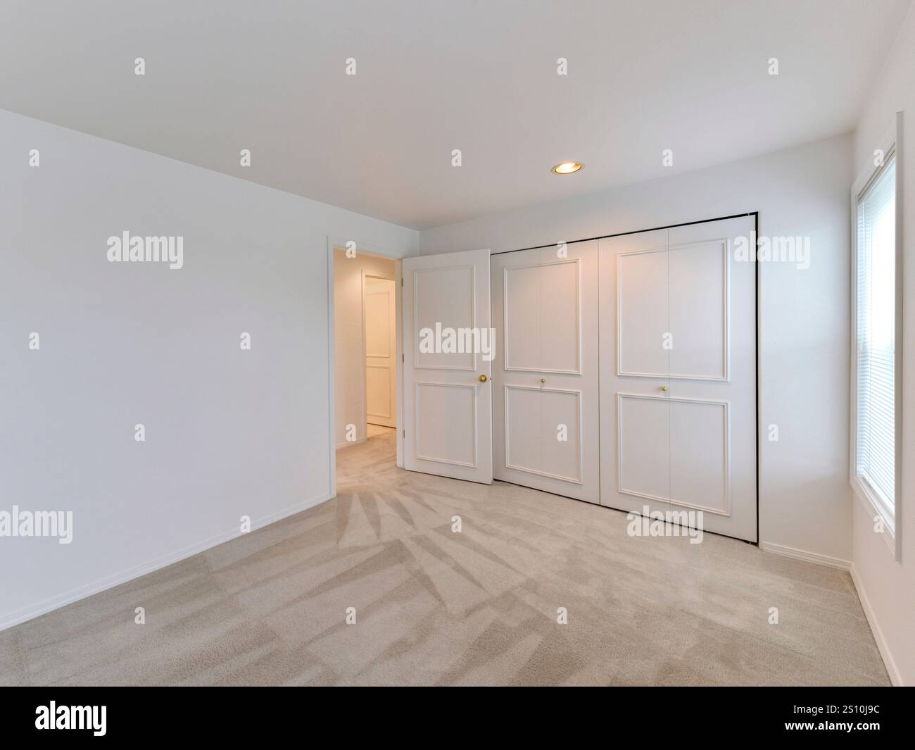 Modern residential empty bedroom interior Stock Photo - Alamy