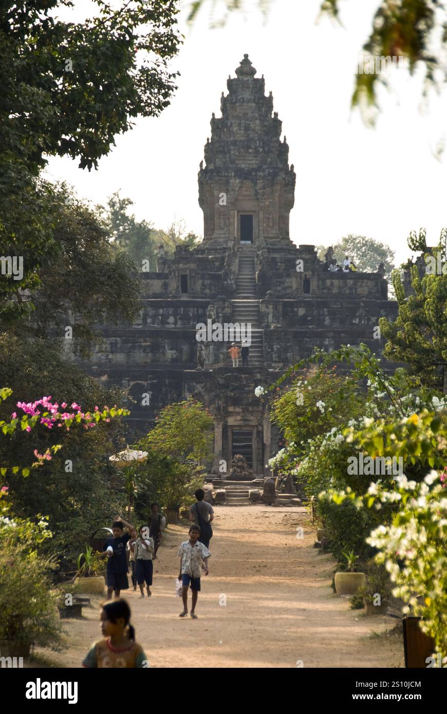 Local Cambodians visit Bakong, the first temple mountain built by the Khmer empire at Angkor ...