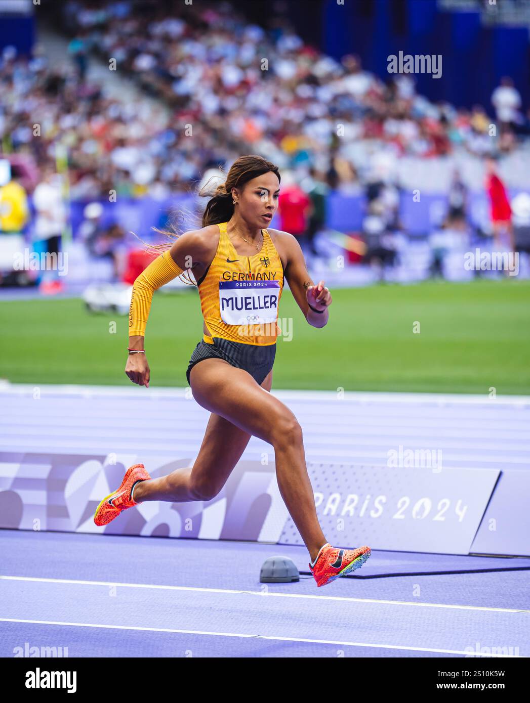 Mikaelle Assani participating in the long jump at the Paris 2024 ...
