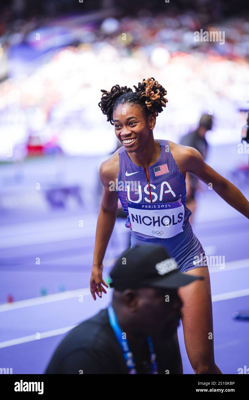 Monae' Nichols participating in the long jump at the Paris 2024 Olympic ...