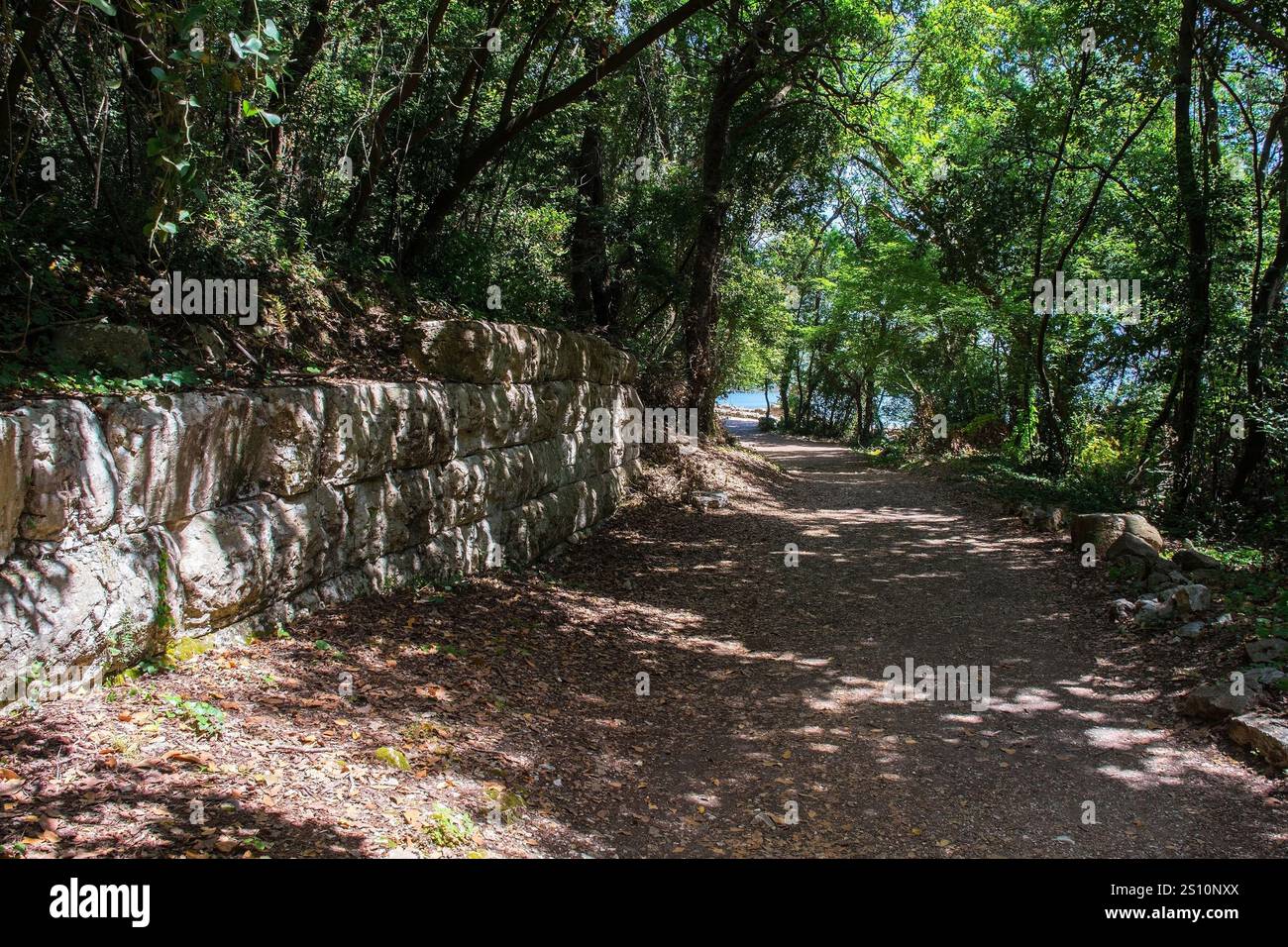 An historic stone wall in Butrint Archaeological Park, within Butrint ...