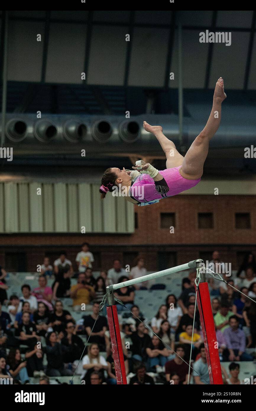 Elisa Agosti, Italian gymnast is performing her uneven bars routine in ...