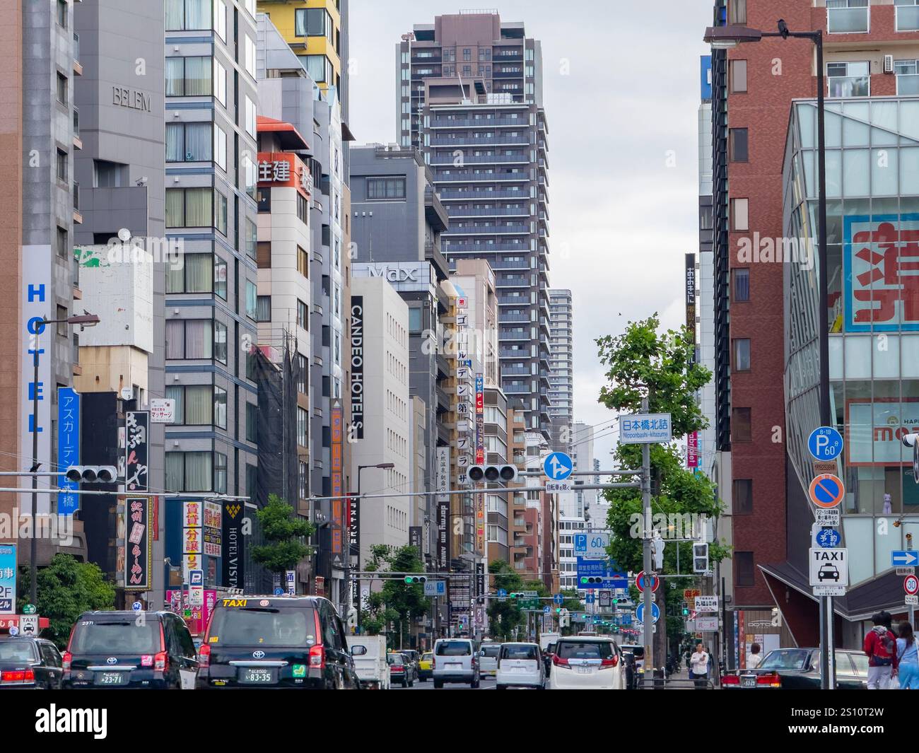 Modern commercial buildings on Sakai suji Avenue at Nipponbashi in ...