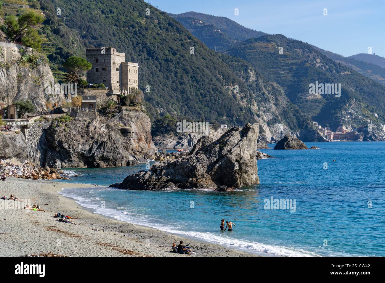 Tourists on the beach in off peak season at Monterosso al Mare, Cinque ...