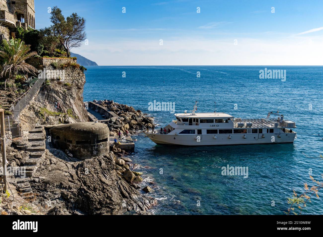 A passenger ferry boat docks at Monterosso al Mare, Cinque Terre, Italy ...