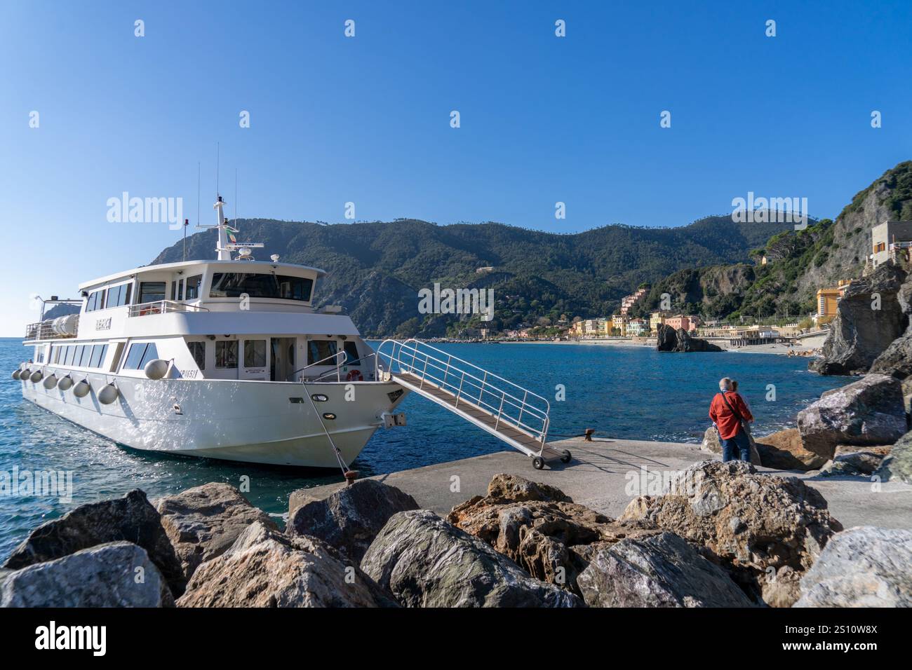 A passenger ferry boat docks at Monterosso al Mare, Cinque Terre, Italy ...