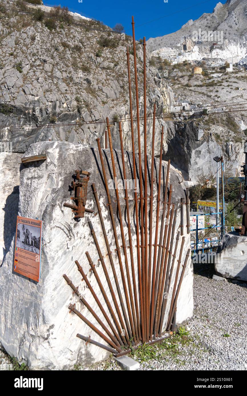A display of drill bits and pneumatic drill for splitting marble blocks ...
