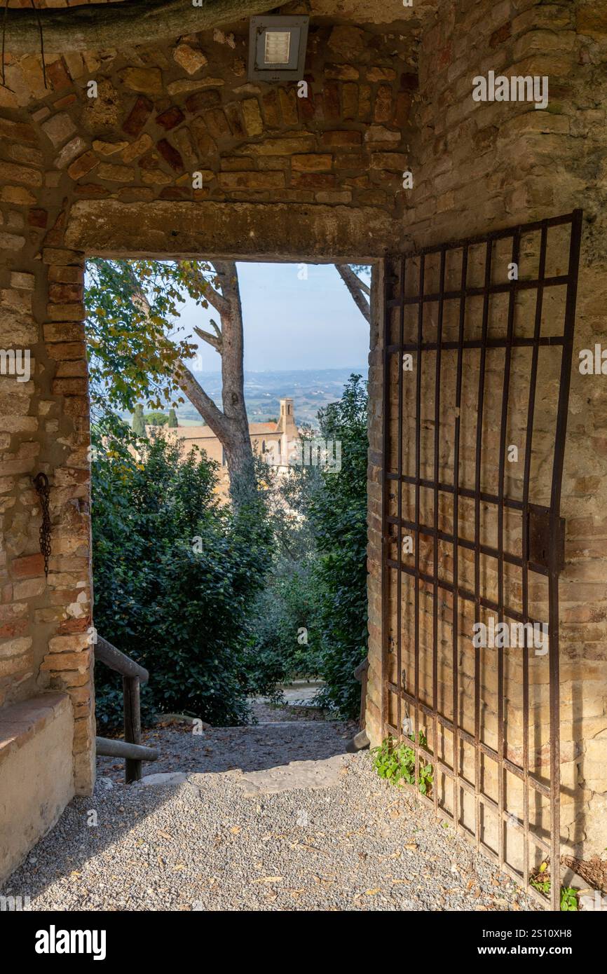 A gate into the Parco della Rocca, the ruins of a medieval fort in the ...