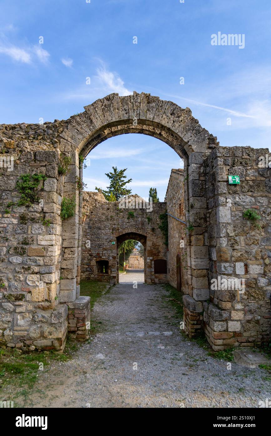 Arched gateway into the Parco della Rocca, the ruins of a medieval fort ...