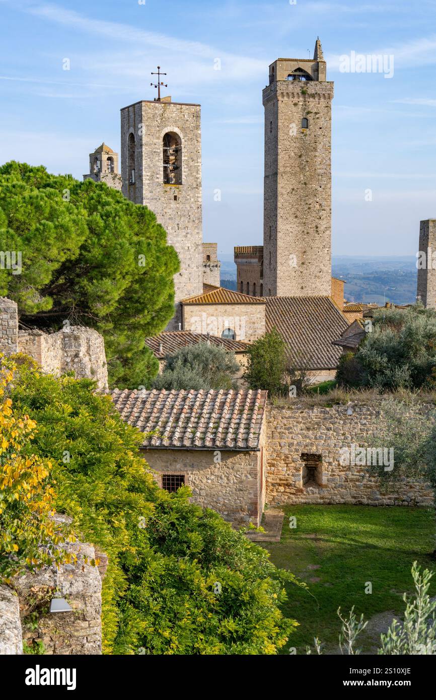 The Parco della Rocca and medieval towers in the walled town of San ...