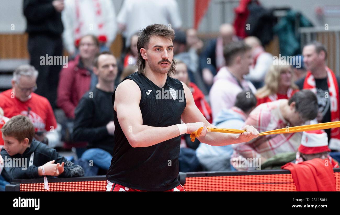 Wuerzburg, Deutschland. 30th Dec, 2024. v.l. Zachary Seljaas (Wuerzburg ...