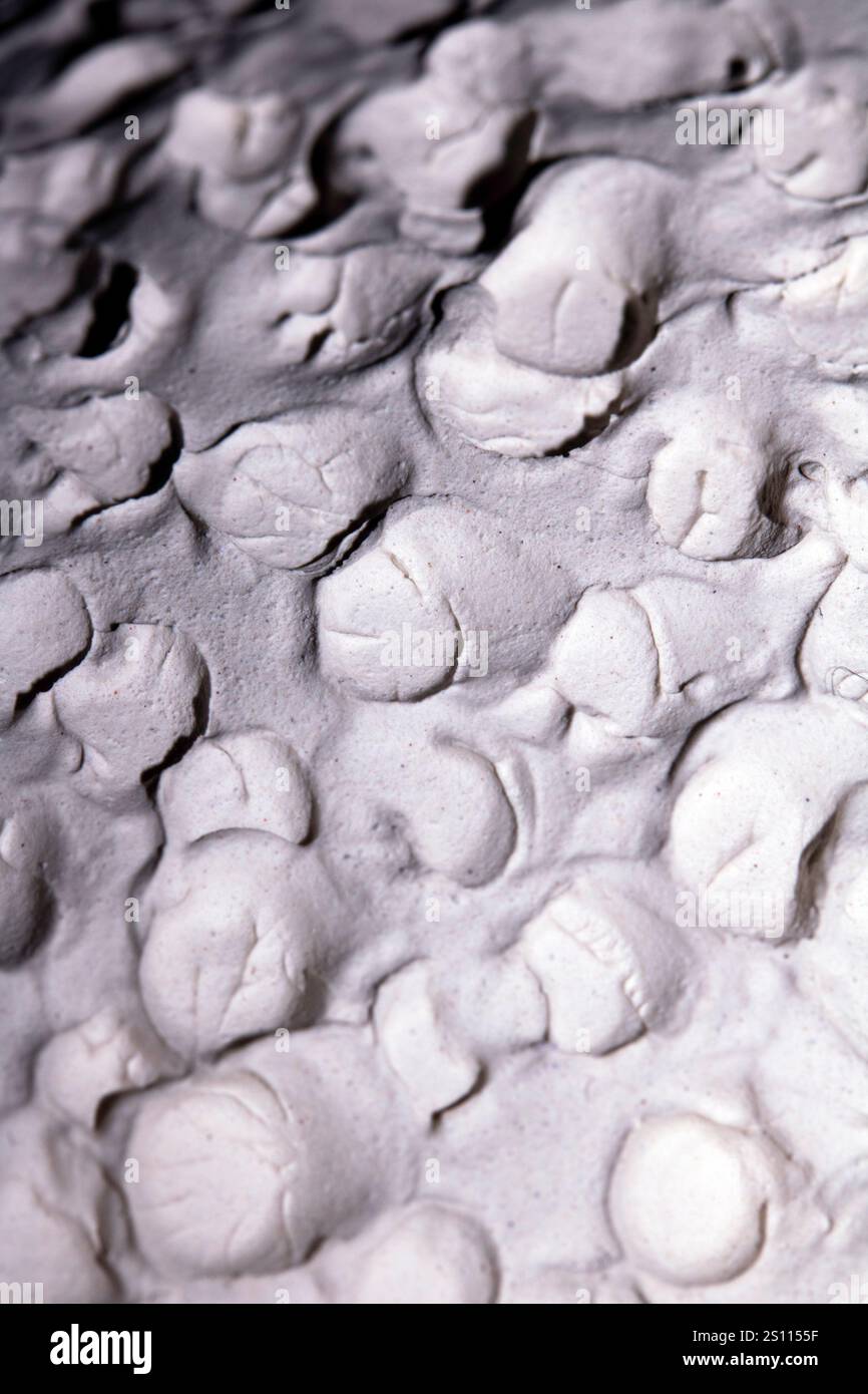 Crater Holes and Dips in Pottery Clay In a Thick White Texture Dots ...