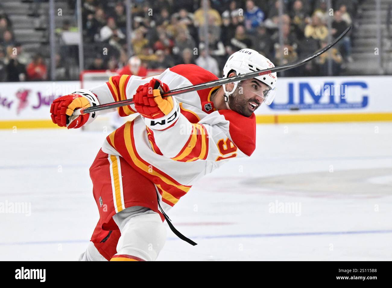 Calgary Flames center Nazem Kadri (91) follows through with a shot ...