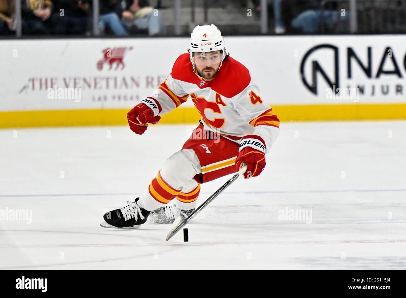 Calgary Flames defenseman Rasmus Andersson (4) handles the puck against ...