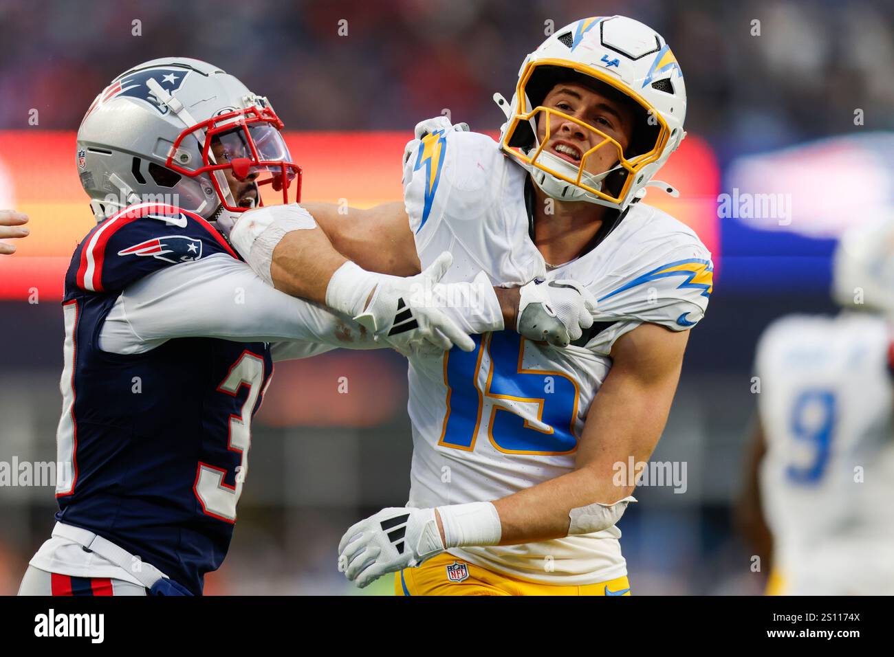 New England Patriots cornerback Jonathan Jones (31) battles with Los ...