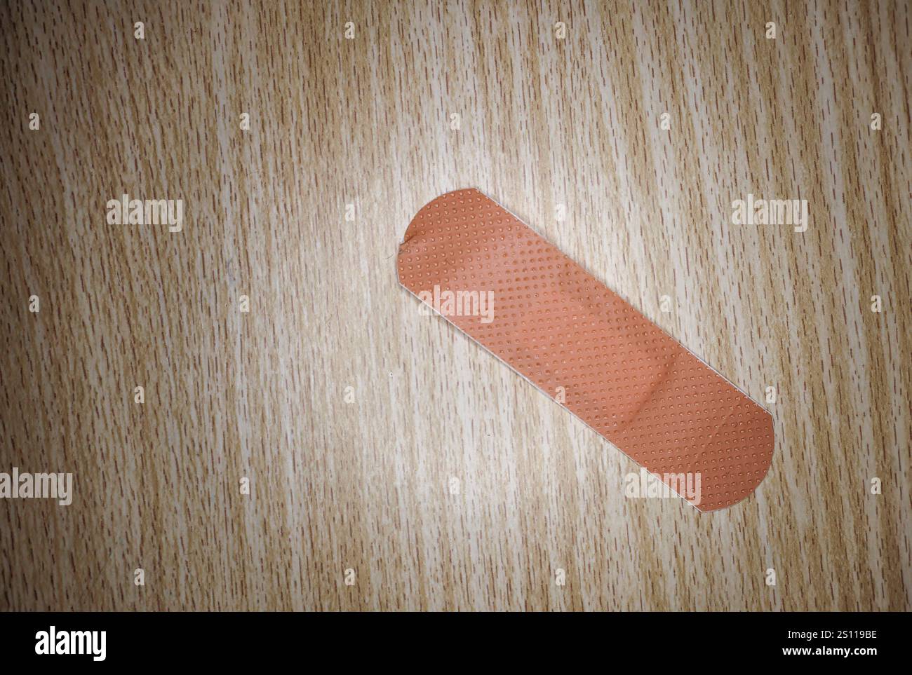 First aid adhedsive plaster isolated with text space. Object photo . No ...