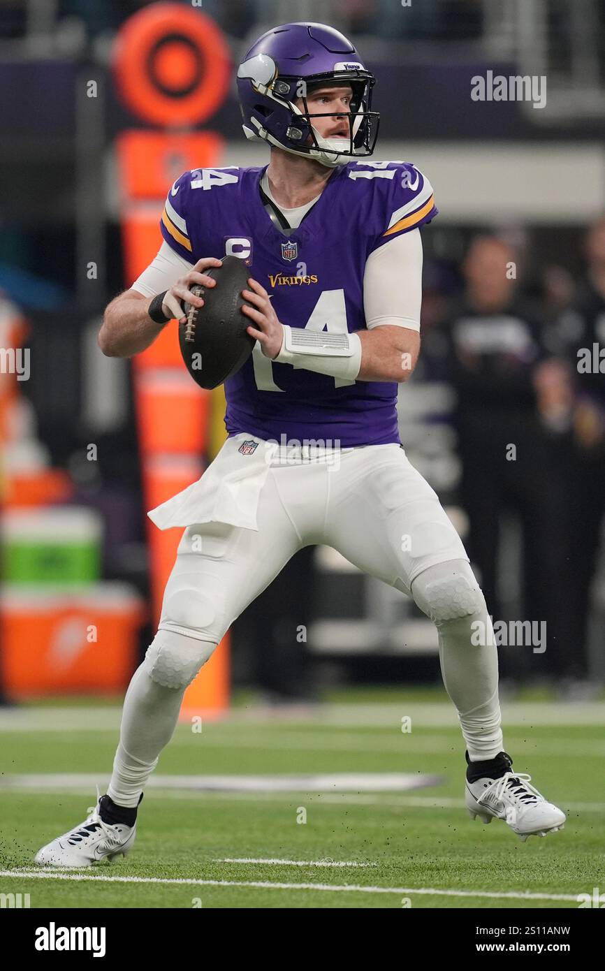 Minnesota Vikings quarterback Sam Darnold (14) looks to pass during the ...
