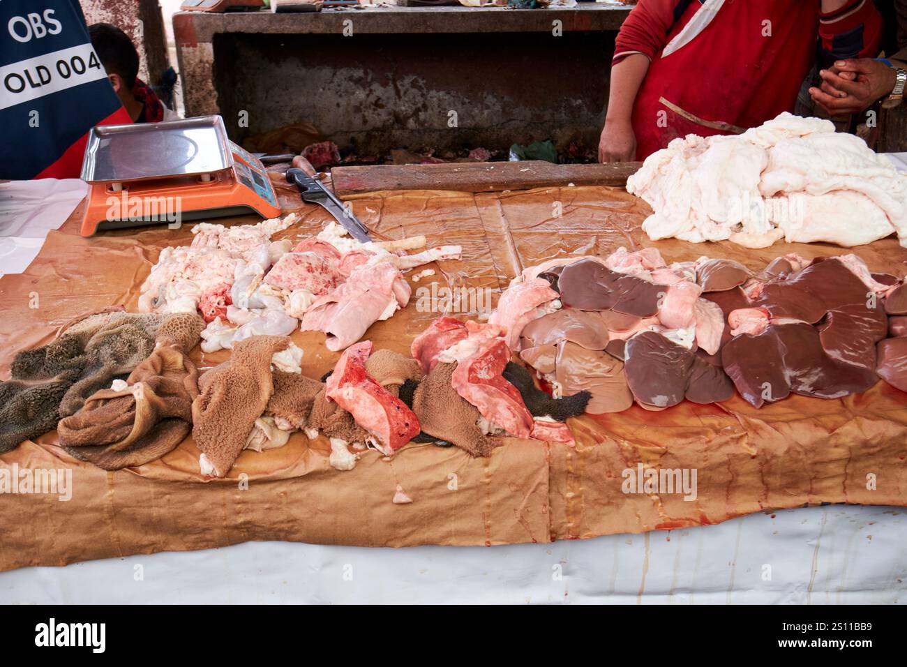 fresh meat offal including lungs tripe fat and kidneys on butchers tall at traditional berber ...