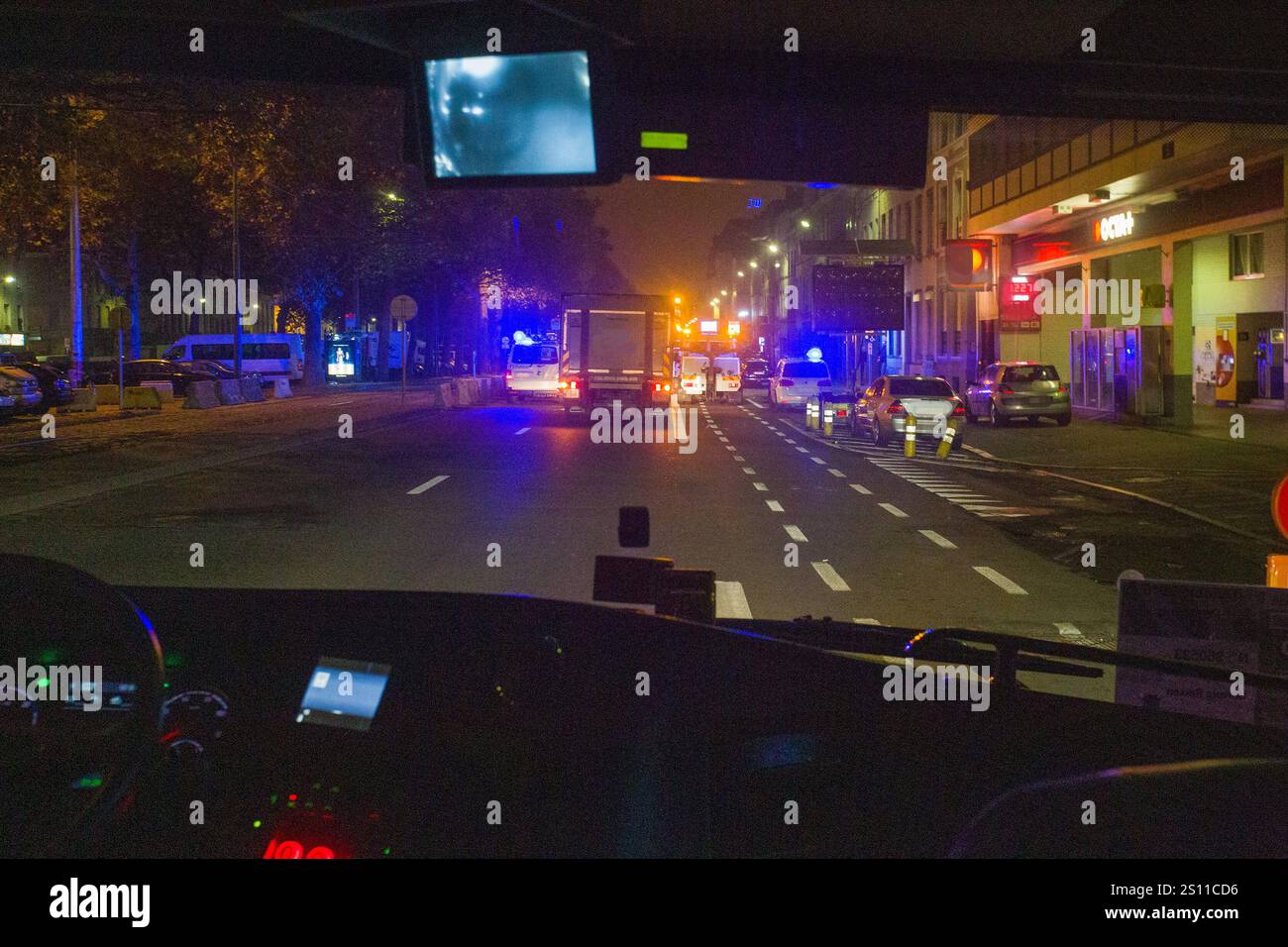 Brussels - night view with blue and red neon lights from windshield of ...