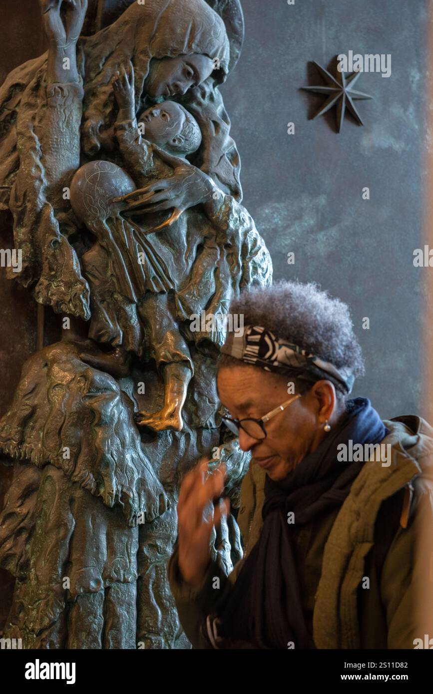 December 30, 2024 - Rome, Italy: Pilgrims pass through the Holy Door of ...