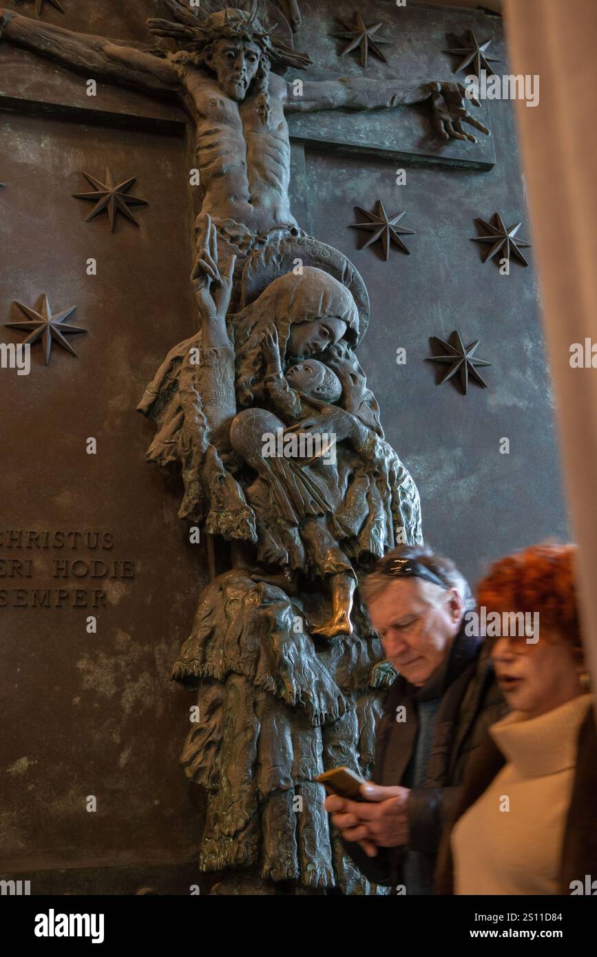 December 30, 2024 - Rome, Italy: Pilgrims pass through the Holy Door of ...