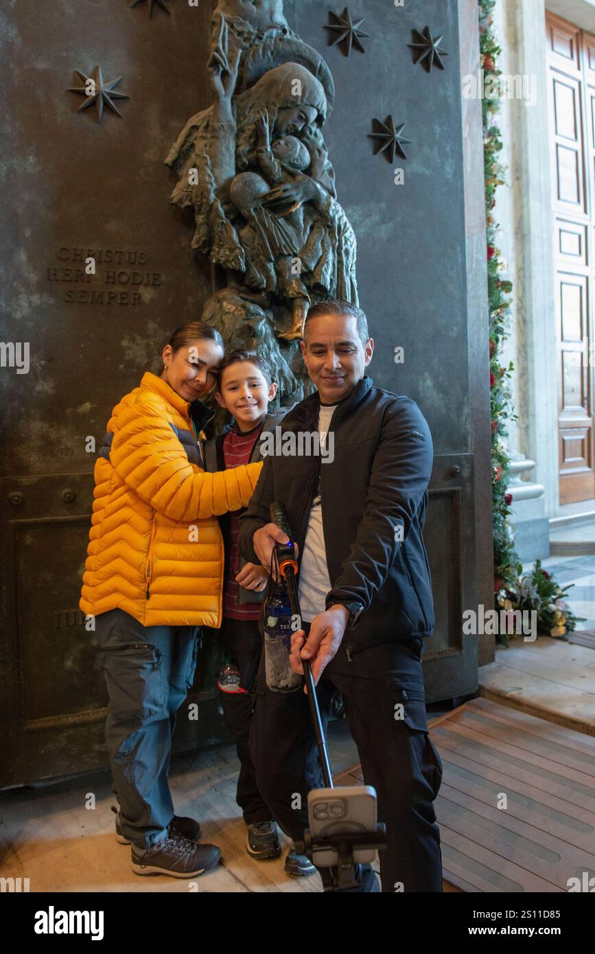 December 30, 2024 - Rome, Italy: Pilgrims pass through the Holy Door of ...
