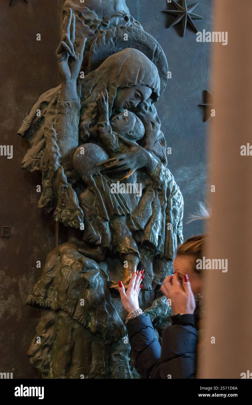 December 30, 2024 - Rome, Italy: Pilgrims pass through the Holy Door of ...