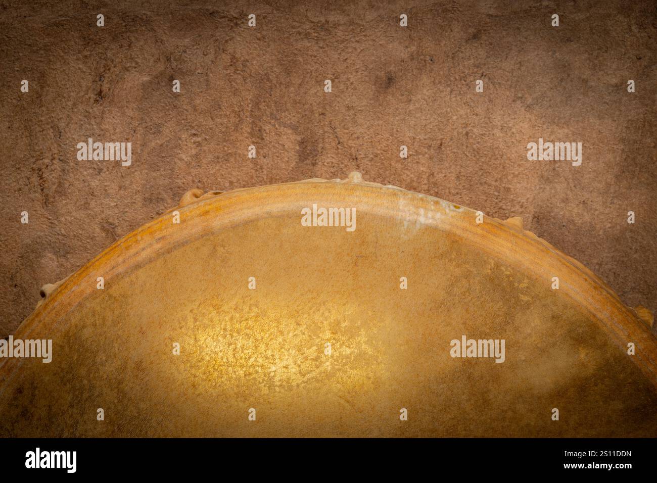 detail of handmade, native American style, shaman frame drum against ...