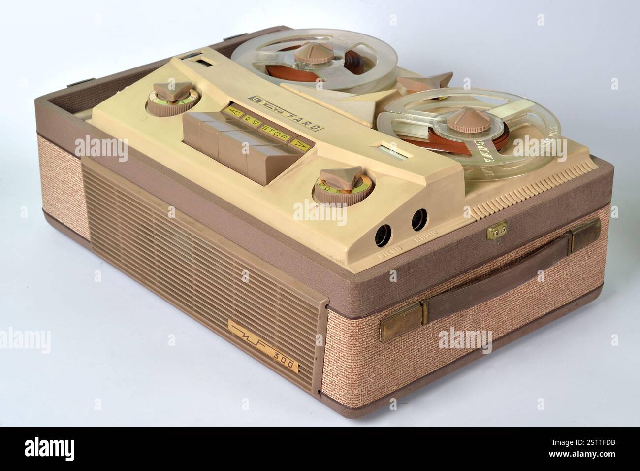 A reel-to-reel tape recorder from the 1960s for recording music and ...