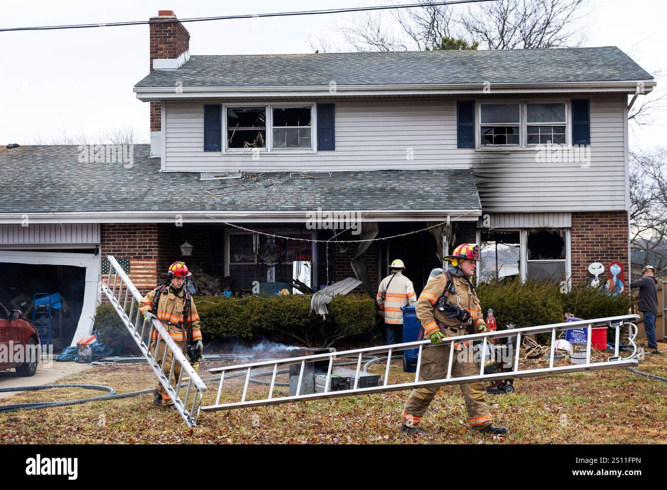 Firefighters battle a fire in Bellevue, Neb., Monday, Dec. 30, 2024 ...