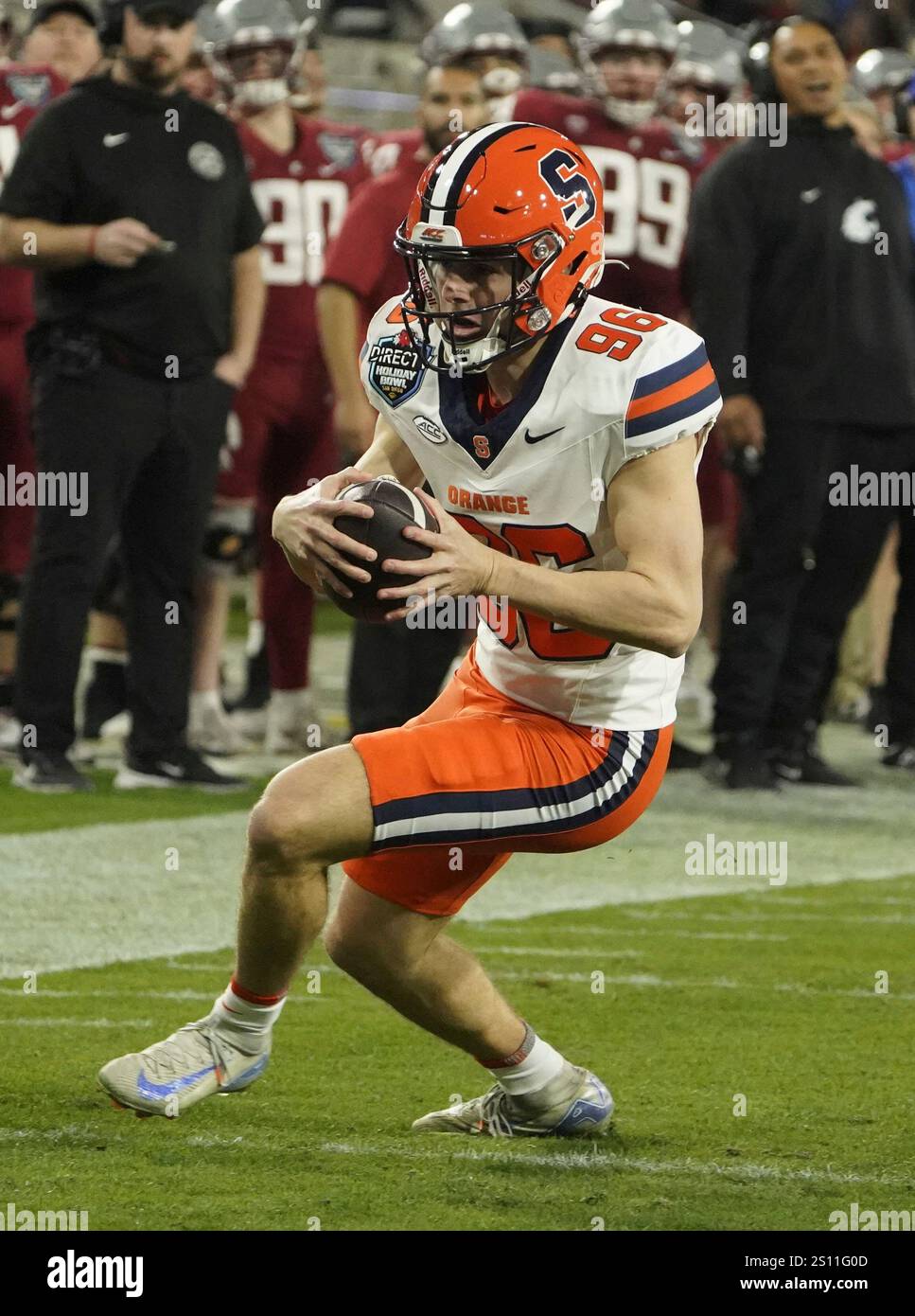 Syracuse kicker Jackson Kennedy (96) runs the football during the ...
