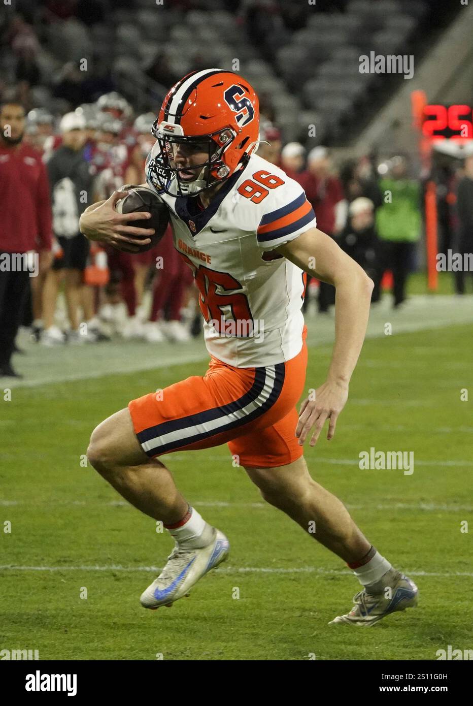 Syracuse kicker Jackson Kennedy (96) runs the football during the ...