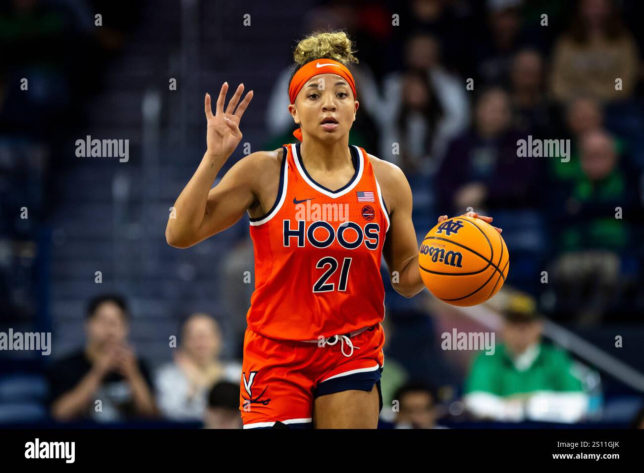 Virginia guard Kymora Johnson (21) calls a play during the first half ...