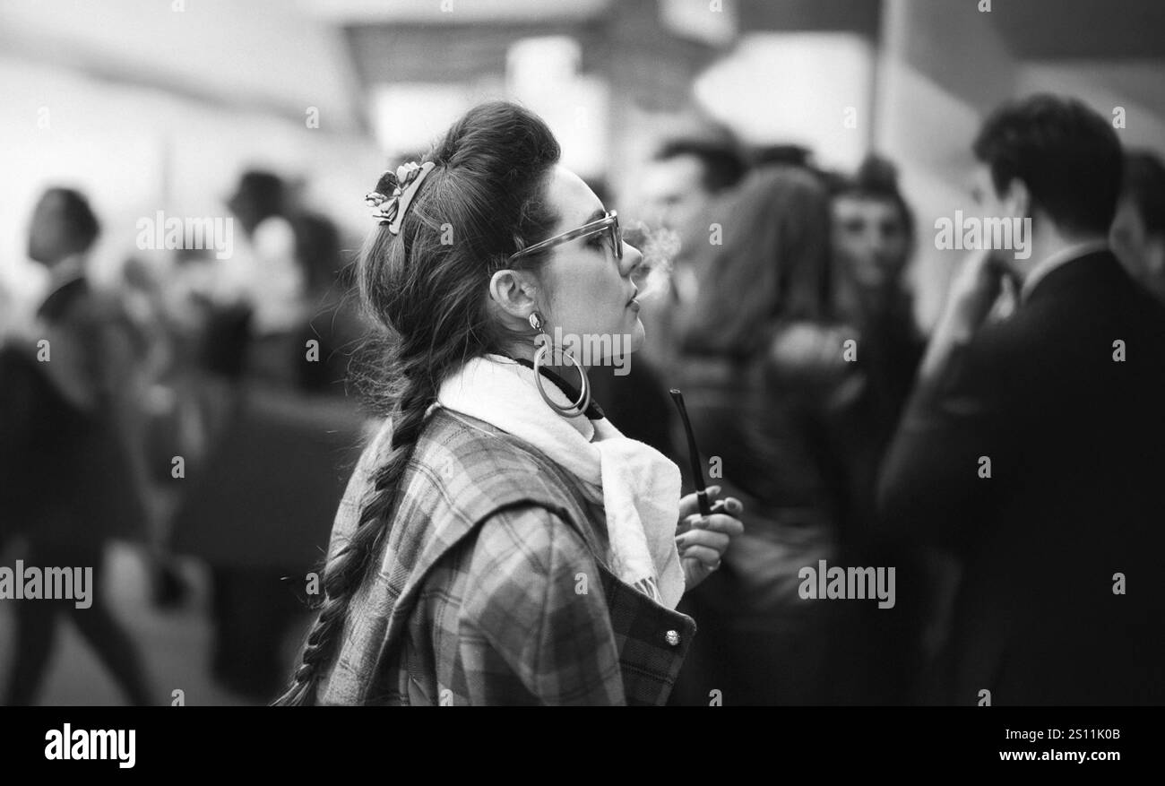 Lady smoking pipe in Paris during fashion week 1989 Stock Photo - Alamy
