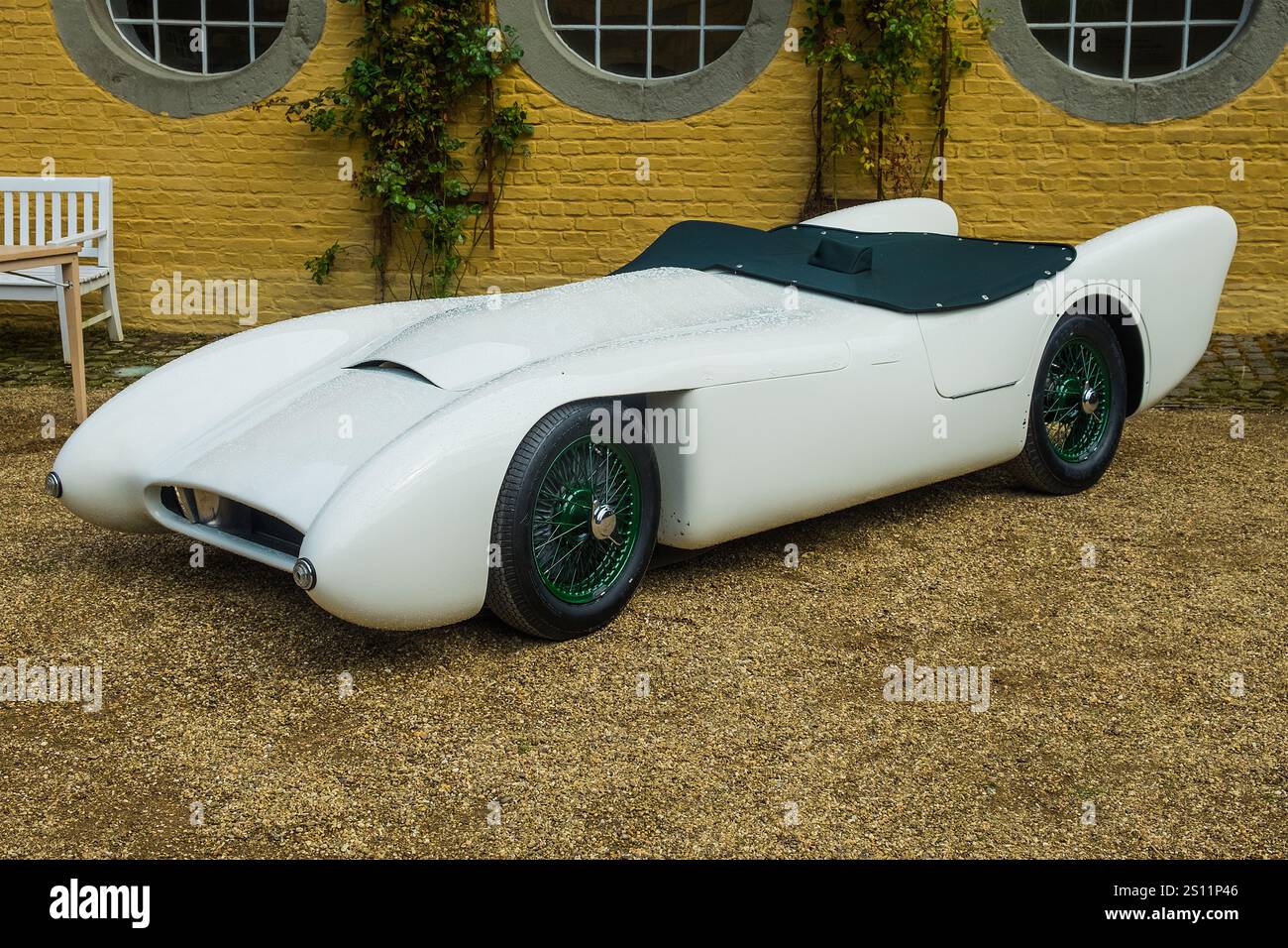 Classic Car: restored white vintage sports car roadster in the rain ...