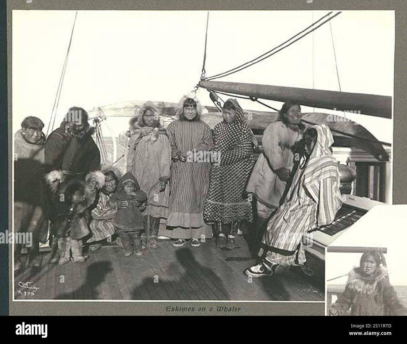 Eskimo women and children on the deck of a whaling ship, Port Clarence ...
