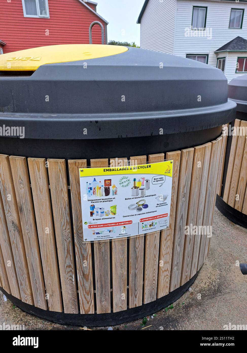 Large round yellow recycling bin for plastic containers in St. Pierre ...