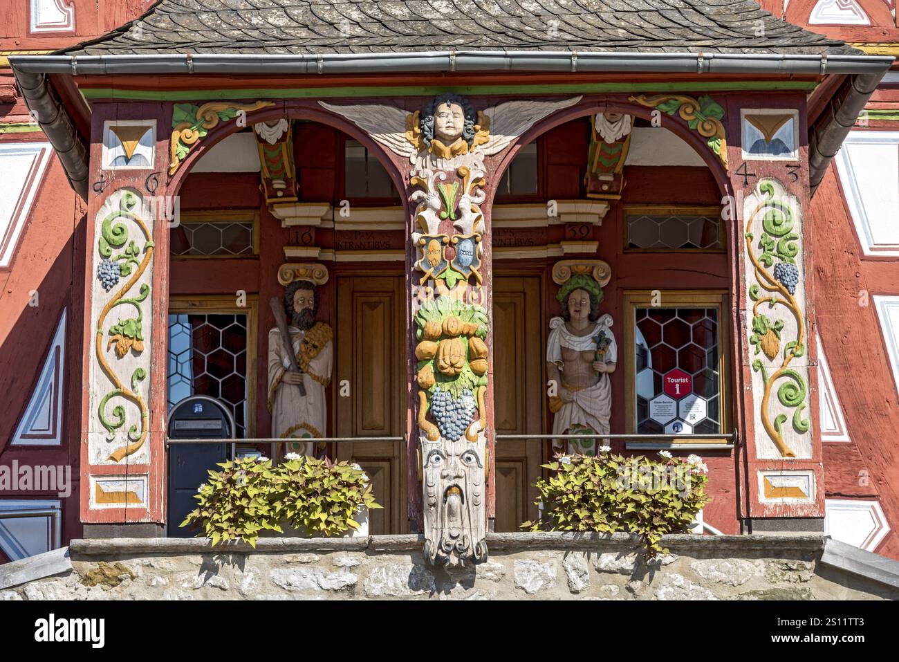 Historic town hall, Renaissance half-timbered house, portal above open ...