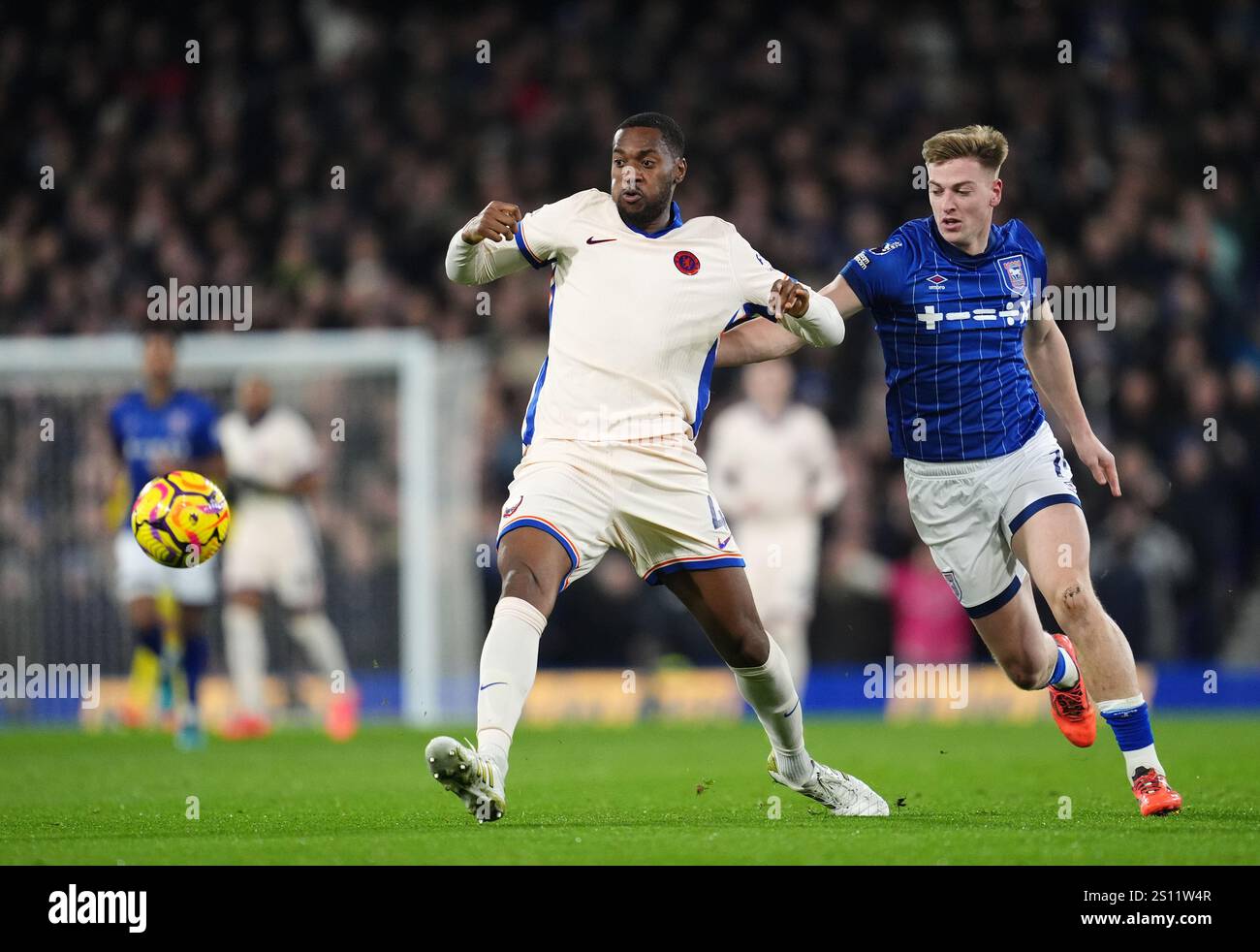 Chelsea's Tosin Adarabioyo in action against Ipswich Town's Liam Delap ...