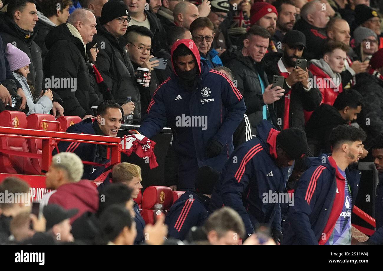 Manchester United's Marcus Rashford makes his way onto the bench prior ...