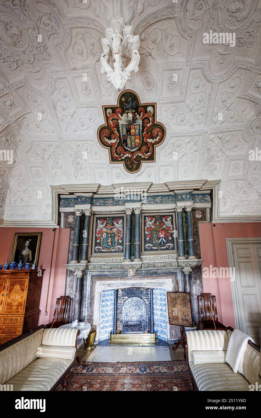 Ceiling decoration and coat of arms with fireplace, Canons Ashby ...