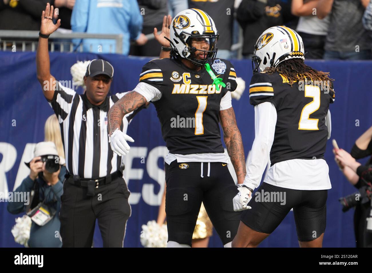 Missouri wide receiver Theo Wease Jr. (1) celebrates his touchdown with ...
