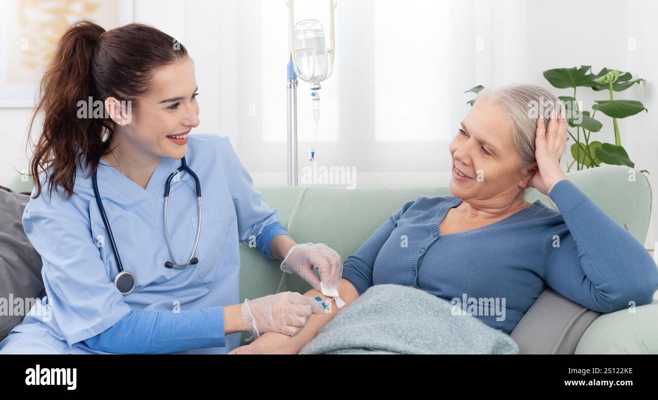 Nurse administering iv therapy home hi-res stock photography and images ...