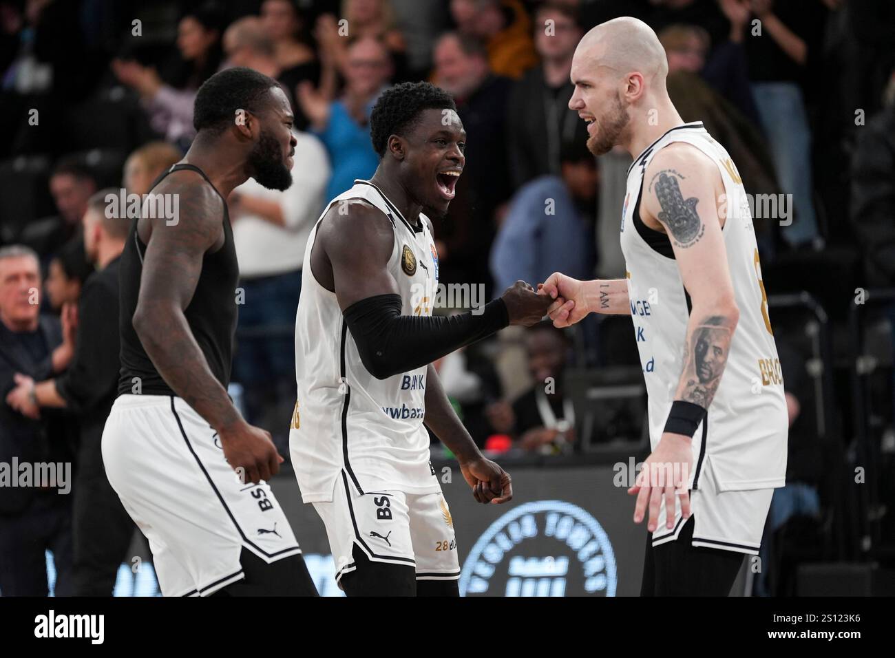 Hamburg, Deutschland. 30th Dec, 2024. Barra Njie (Basketball Loewen Braunschweig, #13) und Arnas ...