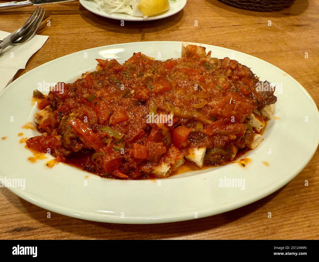Turkish Halep kebap with bread, in Turkey. Traditional food Stock Photo ...