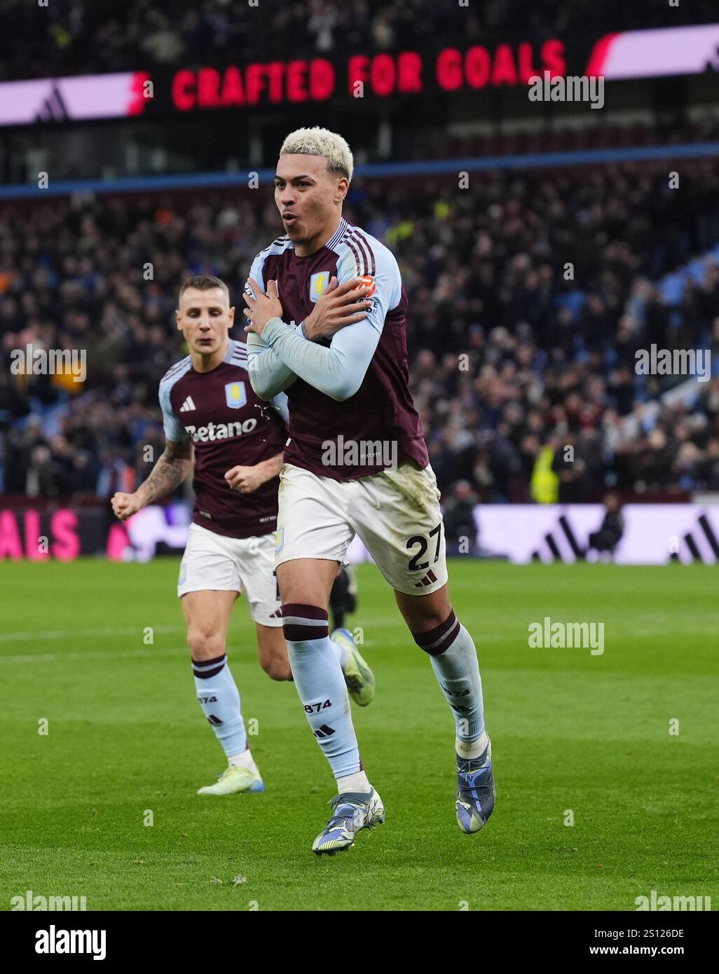 Aston Villa's Morgan Rogers celebrates scoring their side's second goal ...