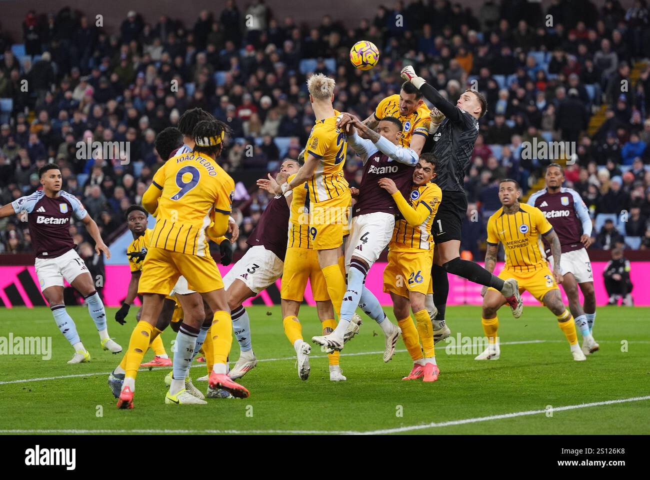 Brighton and Hove Albion goalkeeper Bart Verbruggen punches the ball ...