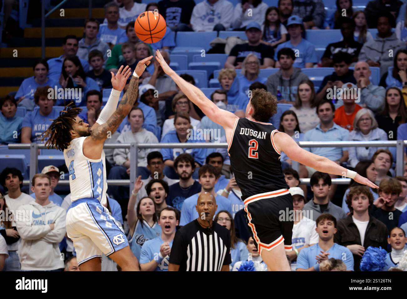 North Carolina guard RJ Davis (4) shoots over Campbell forward Colby ...